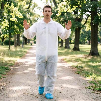 China Hoodless Disposable Protective Coverall with Stand Collar - Non-woven Fabric, CE Certification, Type 5/6 Protection for sale