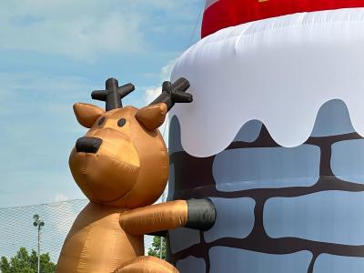 China 20FT 26ft 33ft Inflatable Santa Claus In Chimney With Reindeer Outdoor Christmas Decoration Blow Up Santa Claus for sale