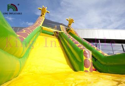 Cina Lo scorrevole asciutto gonfiabile di giallo/verde giraffa del PVC personalizza lo scorrevole per le attività all'aperto in vendita