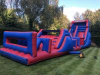 China Lead Free Inflatable Obstacle Courses 60ft With Slide for sale