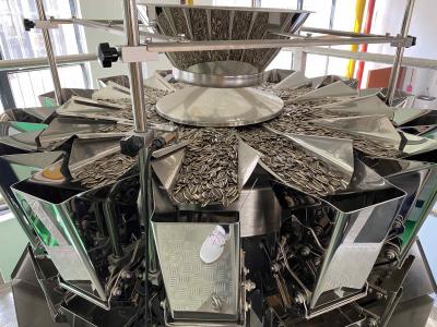 Cina Materiale di imballaggio in plastica usato Macchina di imballaggio a sacchetto rotativo a velocità ridotta per noci e semi in vendita