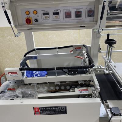 China Automatic L Pof Pe Film Sealer Sealing Auto Shrinking Tunnel Shrink Packing Wrapping Machine for sale