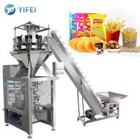 China Auto Weighing 100g Snack Candy Vertical Packing Machine for Precise Pouch Packaging for sale