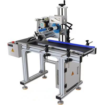 China Automatic Adhesive Tape Carton Box Sealing and Labeling Machine for Packaging Material for sale