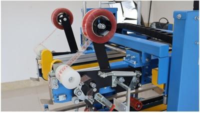Cina Sigillatore automatico a nastro a L per sigillare velocemente e semplicemente i bordi degli angoli delle scatole di cartone in vendita