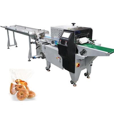 China Horizontal Bun Packaging Type Automatic Pastry Pies Packaging Machine with Printing for sale