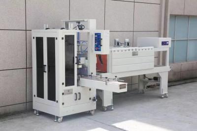 China Electric Driven Automatic Heat Shrink Machine for Milk Bottles and Red Bull Cans for sale