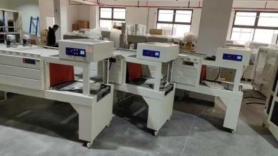 China Electric Driven Automatic Heat Shrink Machine for Milk Bottles and Red Bull Cans for sale