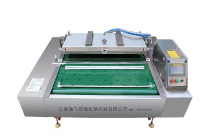 China Automatic Grade Continuous Belt Type Roll Vacuum Packaging Machine with 1800W Power for sale