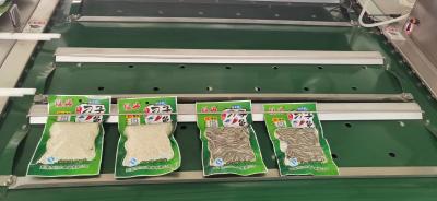 China Automatic Grade Continuous Belt Type Roll Vacuum Packaging Machine with 1800W Power for sale