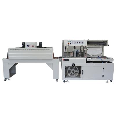 China POF PVC Film Heat Shrink Tunnel Packing Side Sealer with Cutting and Sealing Functions for sale