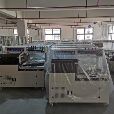 中国 300KG自動 PEフィルム飲料プラスチックミネラルウォーターボトル 熱収縮包装機 販売のため