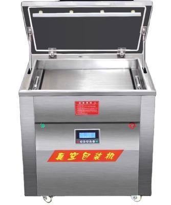 Cina Macchina semiautomatica per imballaggio a vuoto di riso per imballaggi a forma di mattoni da 1 kg, 2 kg, 5 kg e 10 kg in vendita