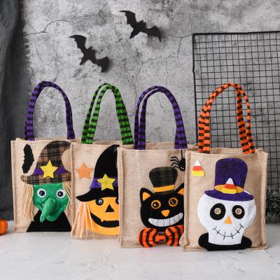 China Hand Bag 26*15cm Halloween Theme Candy Gift Bag with Witch Pumpkin Black Cat Skull for sale