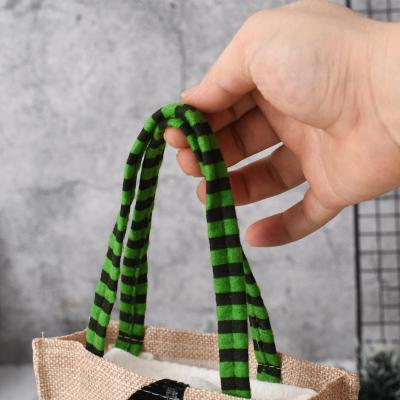 Cina Ordine personalizzato Halloween tema Caramelle Borsa da mano Lenzuola 27g Piccoli regali Borsa Stregone zucca in vendita