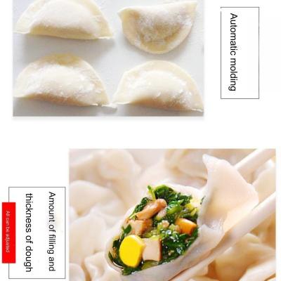 China Commercial Automatic Dumpling Maker Machine Features Automatic Discharge Voltage 220/380V for sale