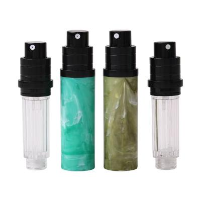 Cina Penna per profumi in plastica portatile marmorizzata da 5 ml personalizzata con spruzzatore in alluminio in vendita