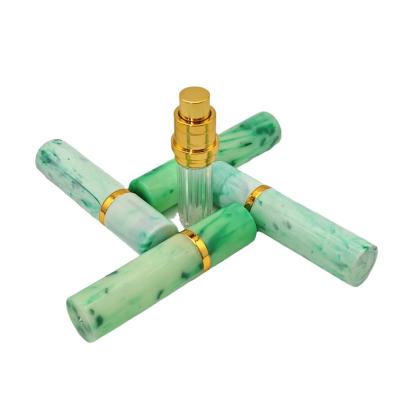 Cina Penna per profumi in plastica portatile marmorizzata da 5 ml personalizzata con spruzzatore in alluminio in vendita