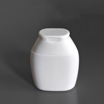 China Flip Top Cap Design 40ml 60ml HDPE Cosmetic Bottle with Customizable Shapes for Shampoo and Skincare for sale