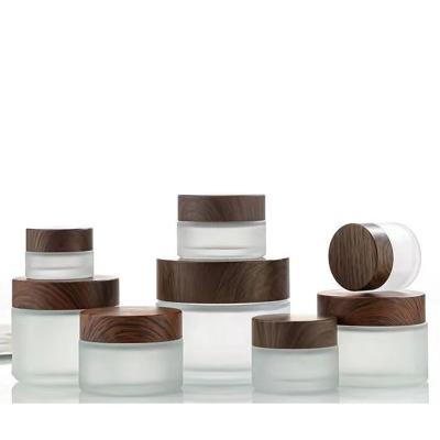 China 5g 10g 15g 30g 50g Empty Frosted Glass Cream Jars Cosmetic Natural Wood  Containers for Eye Cream Face Mask for sale