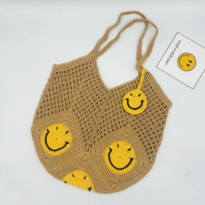 China Smiley Face Openwork Cotton Yarn Knit Bag Summer Large Capacity Women's Tote Bag Vacation Crochet Single-Shoulder Mesh Tote for sale