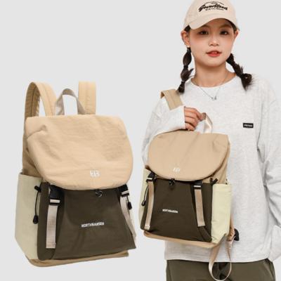 China Colefa Reducing Burden Dopa-mine Color Blocking Travel Large Capacity Lightweight Commuting Leisure New Drawstring Backpack for sale