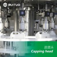 China Huituo Rotary Screw Bottle Cap Sealing Machine Automatic 70bpm for sale