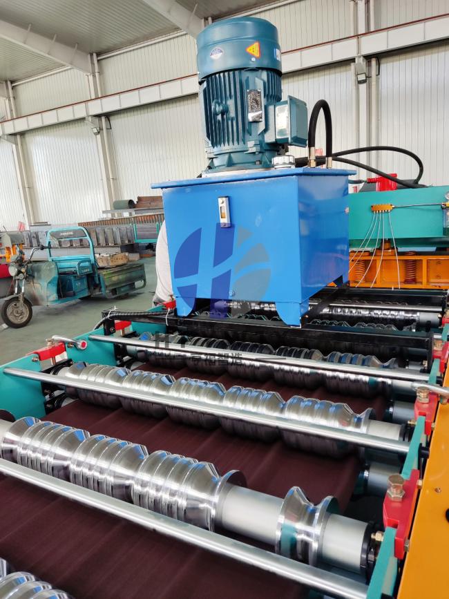 Close-up view of forming rolls and spindle mechanism