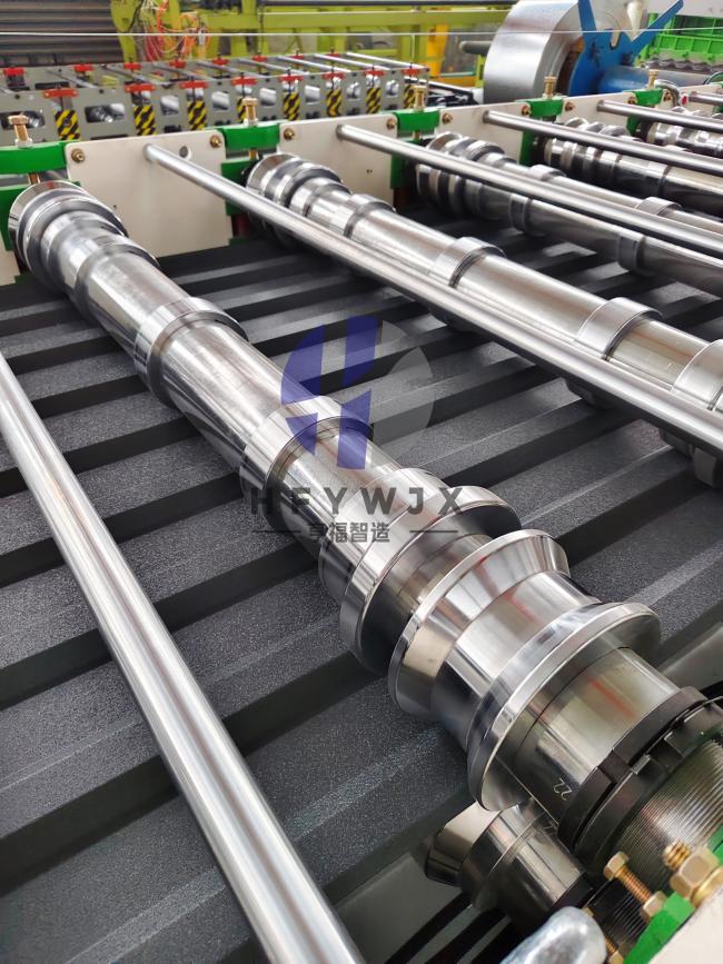 Close-up view of forming rollers and mechanism