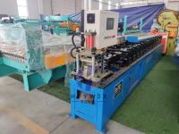China High Speed Roller Shutter Door Roll Forming Machine 15 Stations PLC Control 16mm Frame for sale