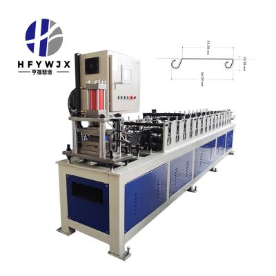 China Automatic Slat Roller Shutter Door Forming Machine Gear Transmission With Hydraulic Pump Power 4kw for sale