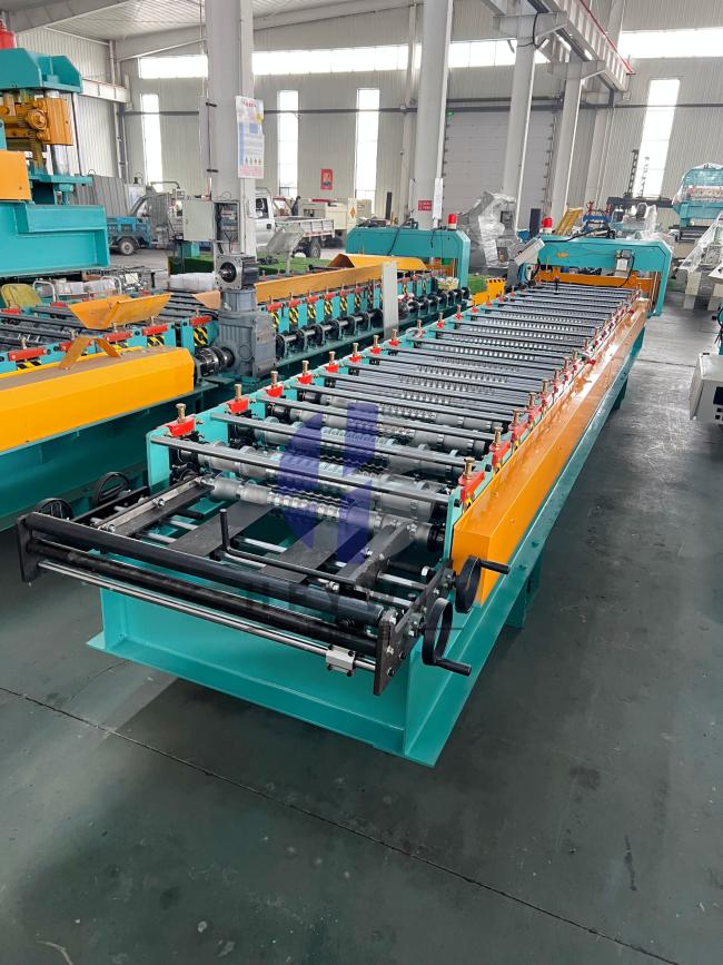 Close-up view of precision rollers and forming mechanism