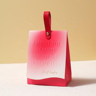 China Custom Color Accepted Christmas Kraft Paper Gift Bag with Customized Logo and Color for sale