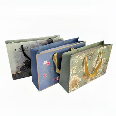 Cina Ordine personalizzato accettato Borsa di carta a manica lunga con logo e design di lusso in vendita