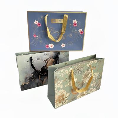 Cina Ordine personalizzato accettato Borsa di carta a manica lunga con logo e design di lusso in vendita