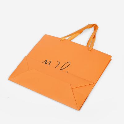 China Encomenda personalizada Segamento Mão Manga Longa Manga Saco de papel com o seu logotipo à venda