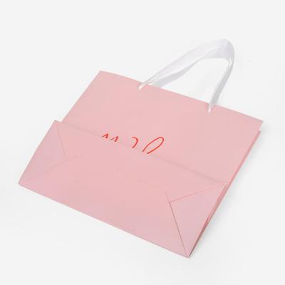 China Encomenda personalizada Segamento Mão Manga Longa Manga Saco de papel com o seu logotipo à venda