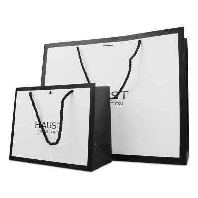 Cina Tasse di carta per la spesa in cartone d'avorio con il tuo disegno personalizzato in vendita