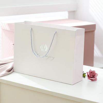 Cina Borsa di cartone d' avorio, borsa di carta con colore personalizzato, accettata in vendita