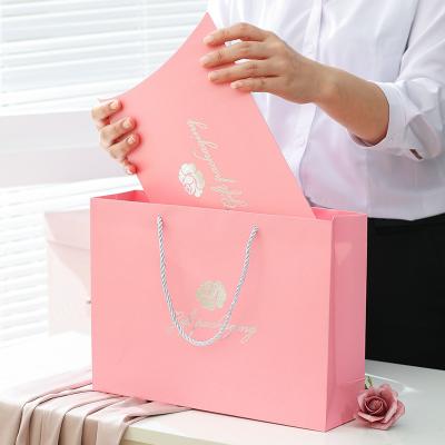Cina Borsa di cartone d' avorio, borsa di carta con colore personalizzato, accettata in vendita