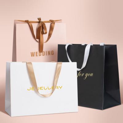Cina Industriale CMYK 4 colori Offset carta da stampa sacchetto per scarpe abbigliamento con logo personalizzato in vendita