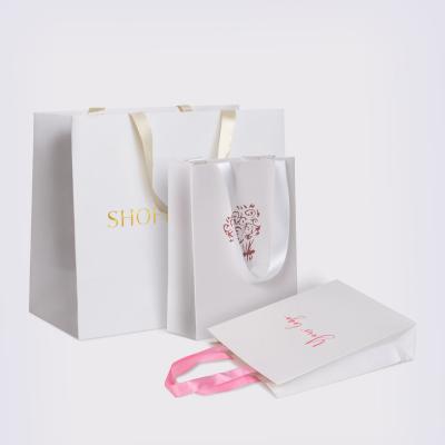 Cina Industriale CMYK 4 colori Offset carta da stampa sacchetto per scarpe abbigliamento con logo personalizzato in vendita