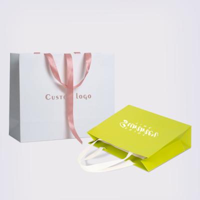 Cina Industriale CMYK 4 colori Offset carta da stampa sacchetto per scarpe abbigliamento con logo personalizzato in vendita