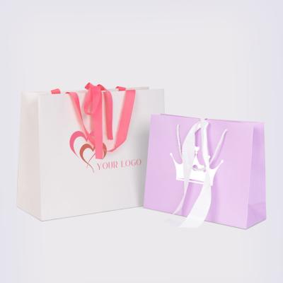 Cina Industriale CMYK 4 colori Offset carta da stampa sacchetto per scarpe abbigliamento con logo personalizzato in vendita