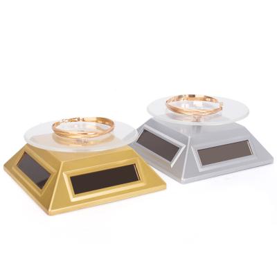 China 360 Grad drehbarer LED-Solar-Displayständer zur Präsentation von Mobiltelefonen, Schmuck und Uhren zu verkaufen