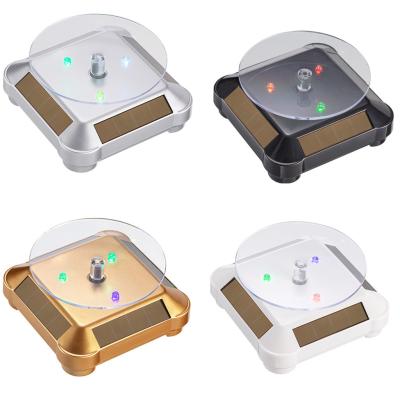 China Led Light Solar Rotating Display Stand With Solar Battery Powered 2-4RPM Speed for sale
