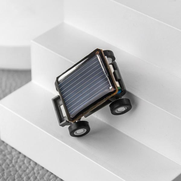 Quality Black Colored Novel Mini Solar Car Toys Small Juguetes Novedosos Customized Logo for sale