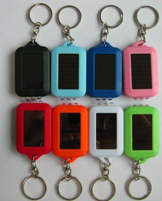 China Customized Colorful Solar Key Ring Three Led Light Solar Power Keychain for sale
