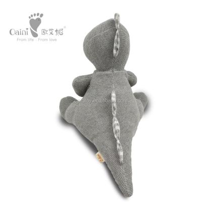 Cina ODM Lenitivo Peluche Ricamo Logo Grigio Dinosauro Peluche CE in vendita