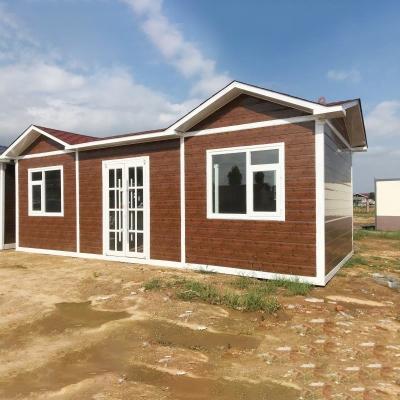 Cina Porta in acciaio casa mobile casa modulare contenitore prefabbricato con muro tenda di vetro in vendita